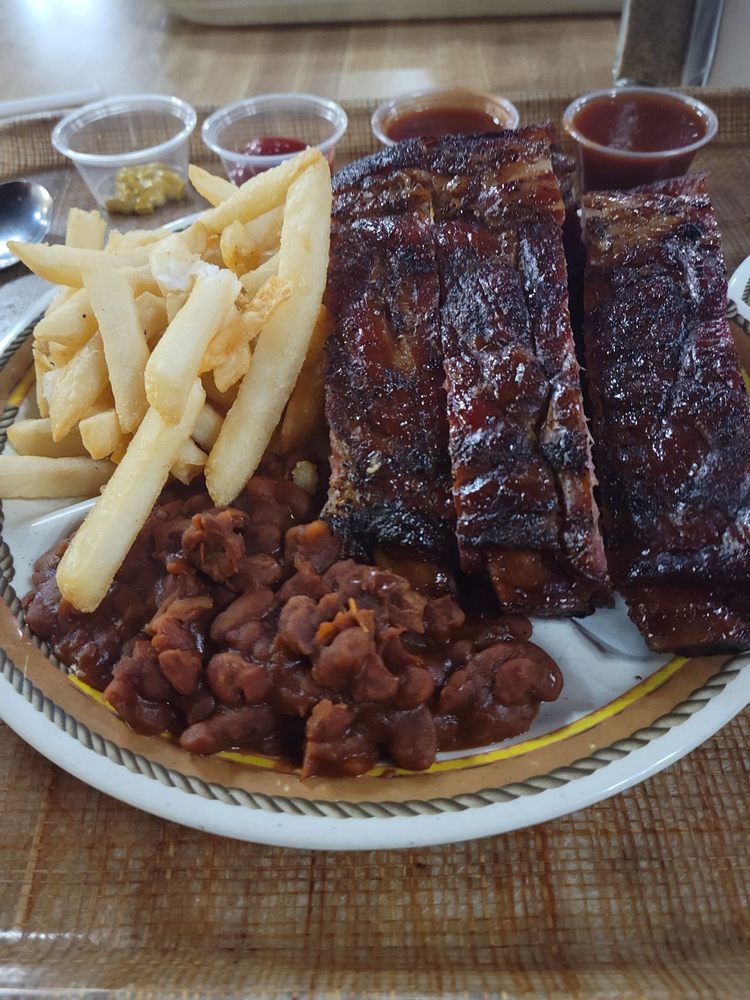 Combination number three (large). Pork ribs, baked beans, and French ...