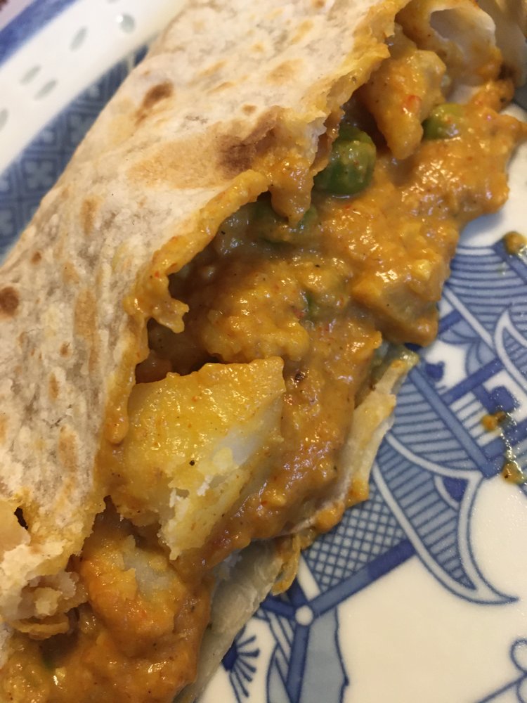 BUTTER CHICKEN ROTI - Updated July 2025 - 13 Photos - 1041 Coxwell ...