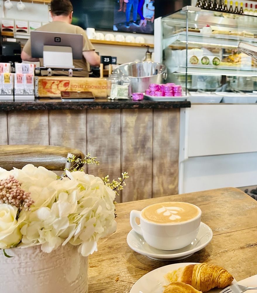 Wild Strawberry with a latte and croissant inside seating. - Yelp