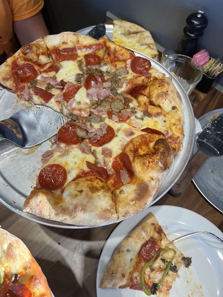 UNIVERSAL PIZZA - Updated September 2024 - 2226 N Charles G Seivers ...