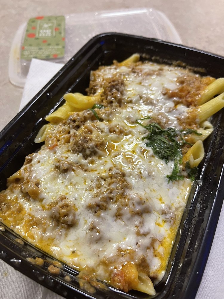 Penne pasta with creamy tomato & meat sauce topped w/ cheese - Yelp